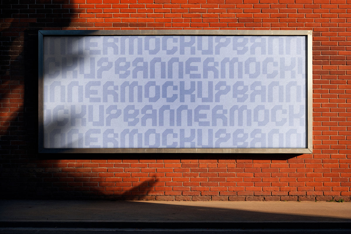Brick Wall Billboard Mockup by Pixelbuddha